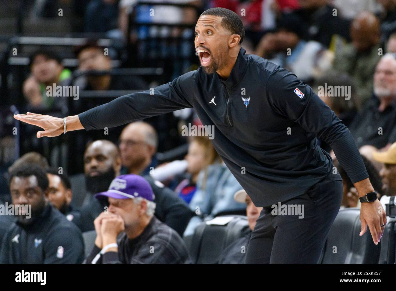 Charlotte Hornets head coach Charles Lee shouts instructions form the ...