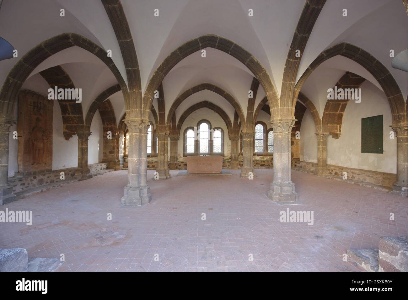 Chapter house with tomb slab and columns in Arnsburg Abbey, interior ...