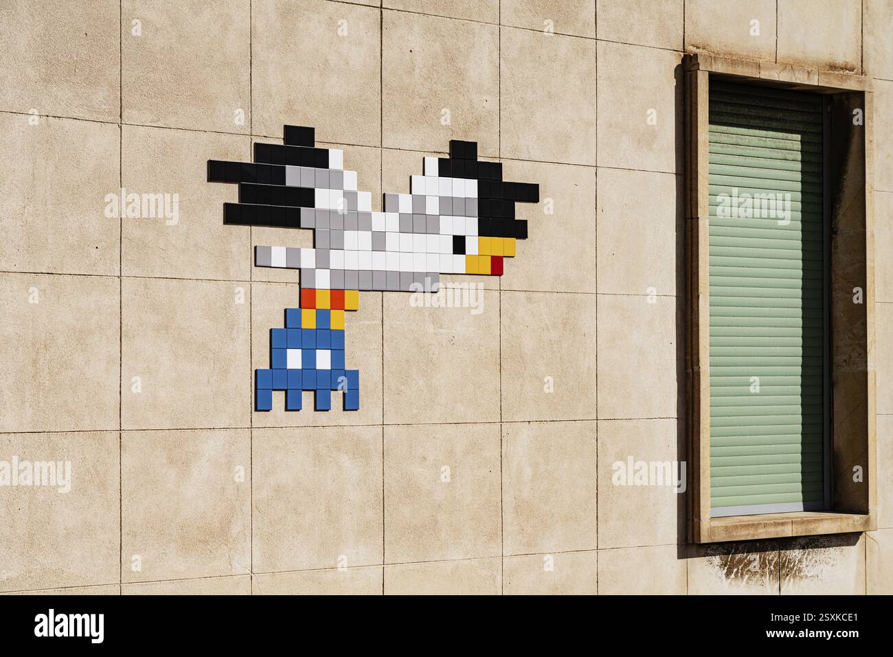 Urban art by Invader, artist, artist, on house wall in Marseille ...