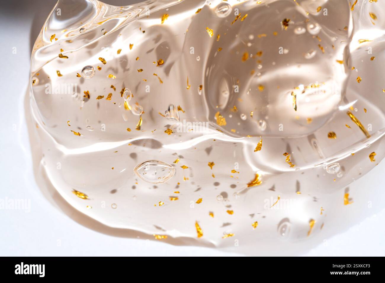 Luxury transparent cream gel with sparkling 24k gold particles, perfect ...