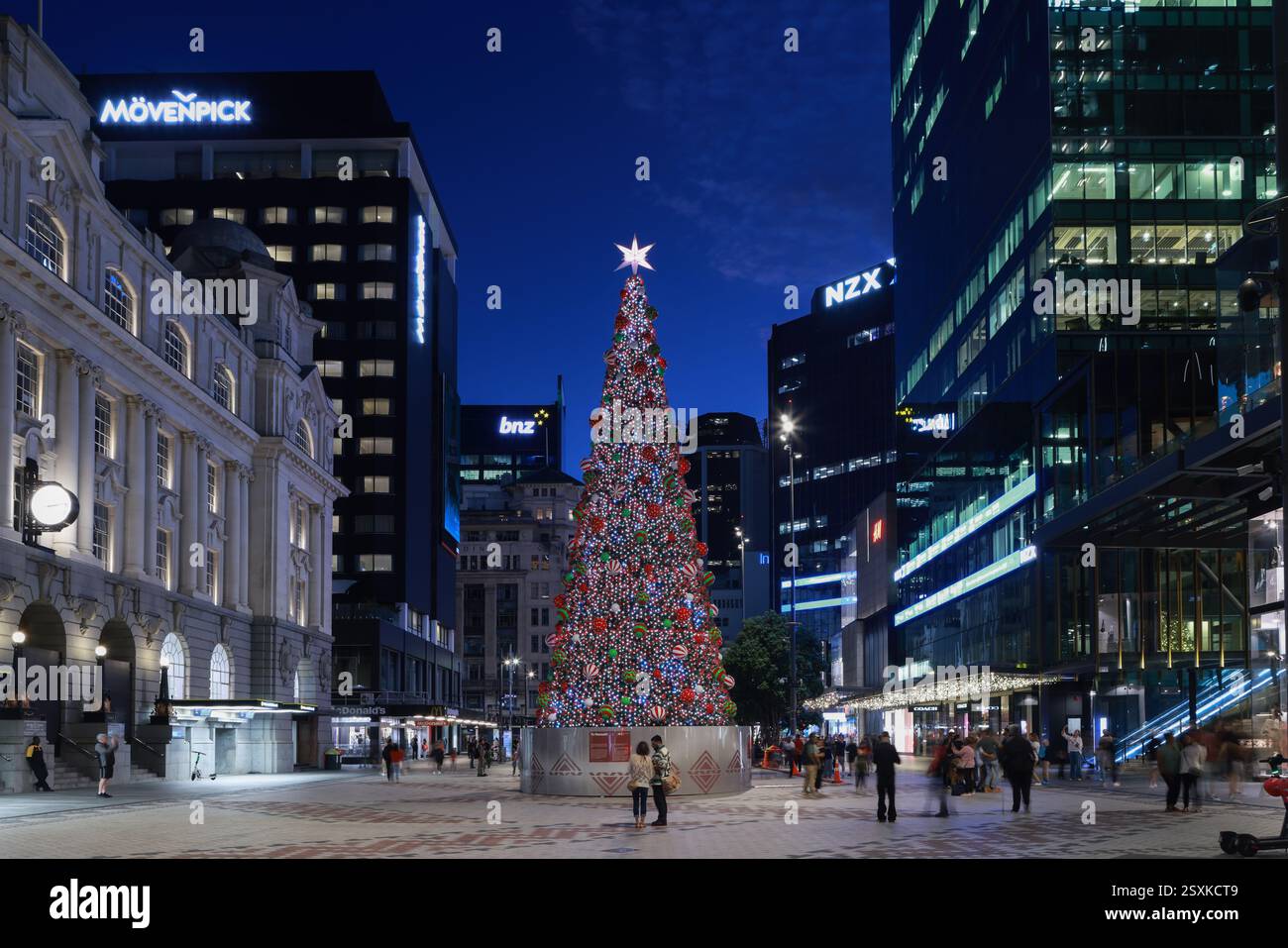Festive christmas tree stands tall hi-res stock photography and images ...