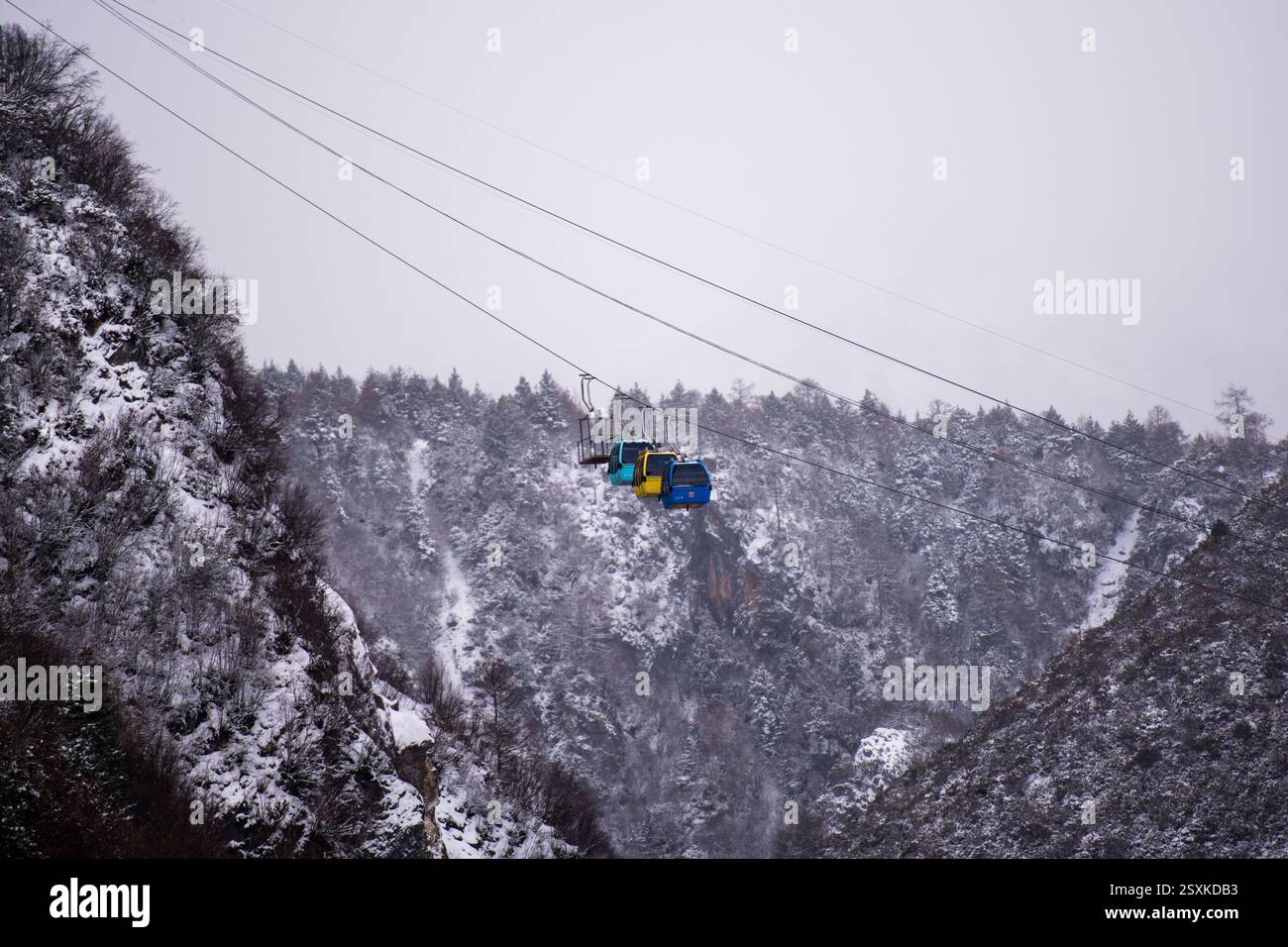 Deqen, China's Yunnan Province. 24th Feb, 2025. Cable cars are seen at ...