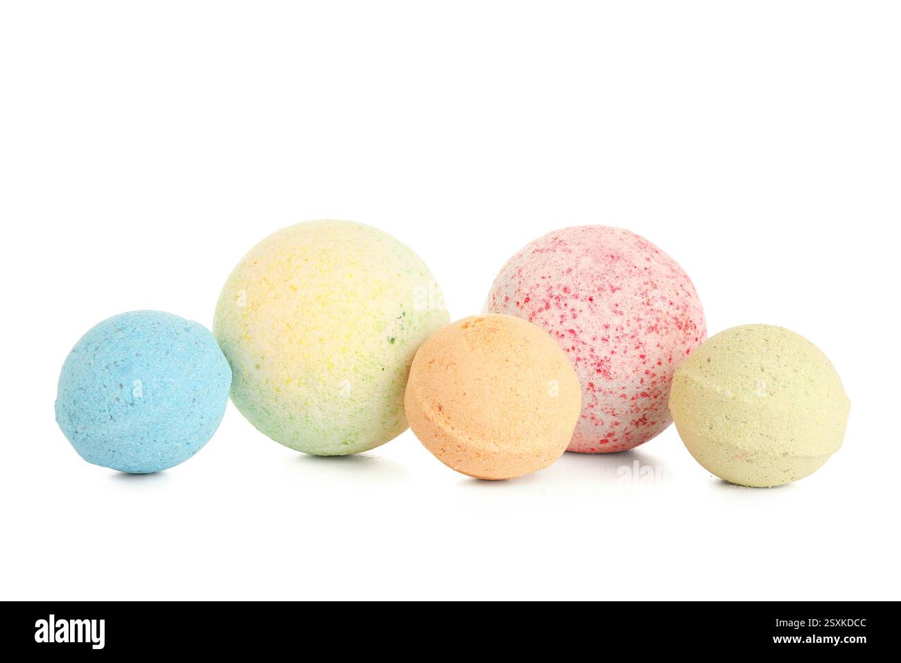 Colorful bath bombs on white background Stock Photo - Alamy