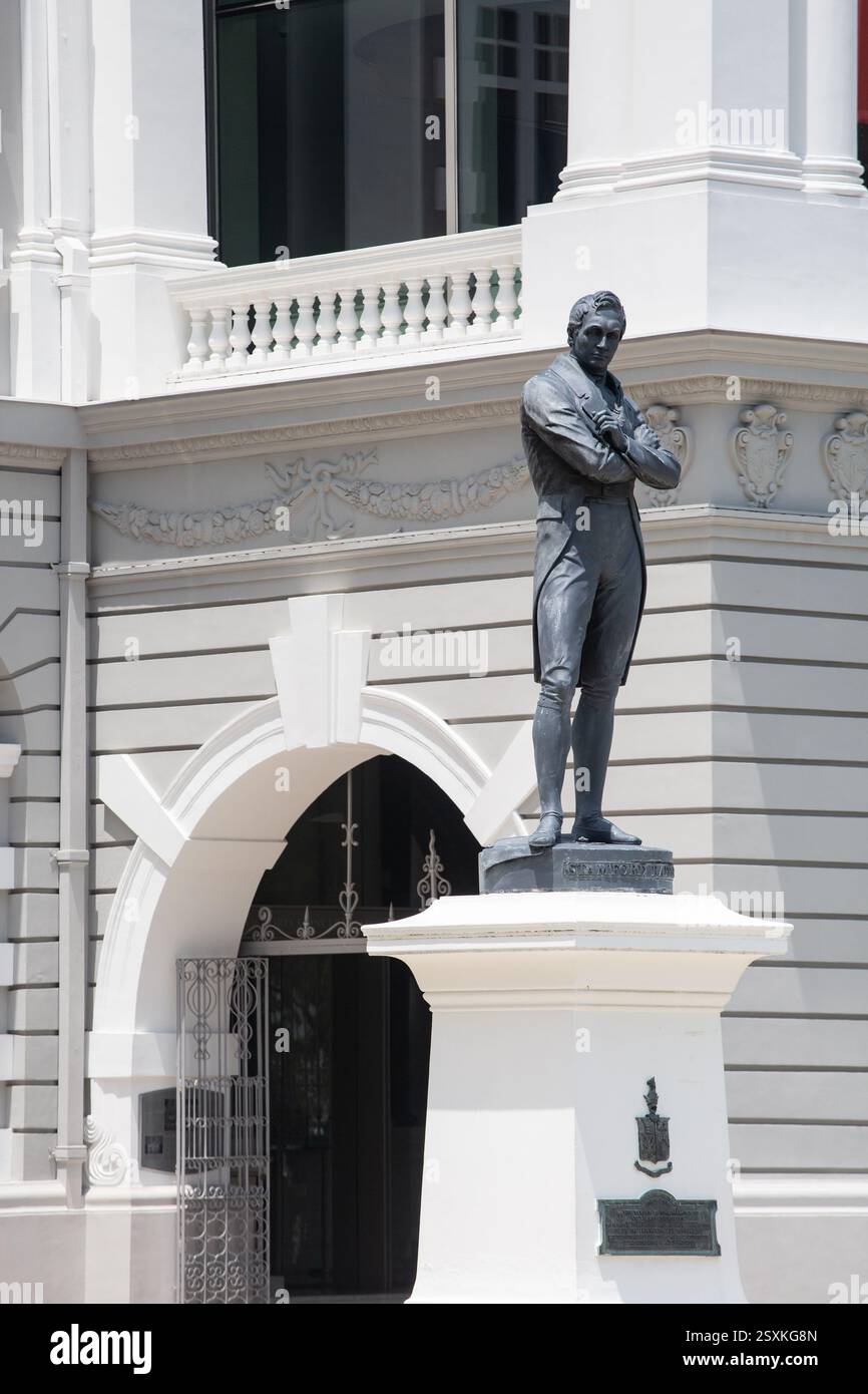 Sir Stamford Raffles standing black statue bronze sculpture, pose crossing his arms. Founder of ...