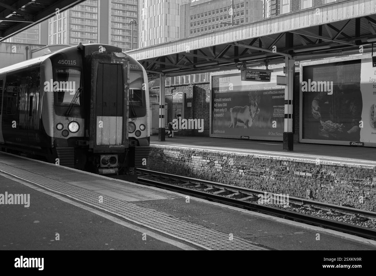 Train board at station Black and White Stock Photos & Images - Alamy
