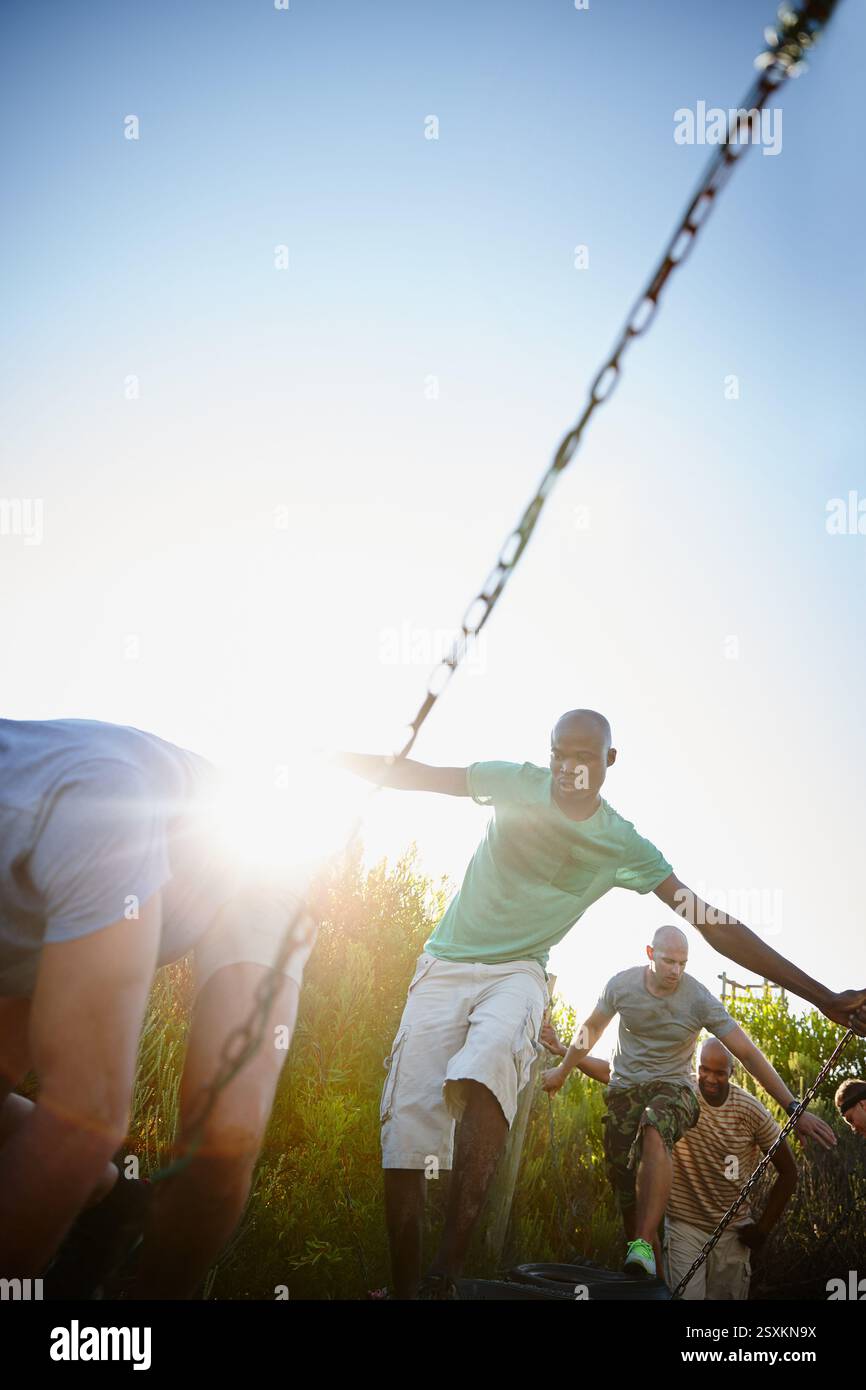 Active, men and walking with obstacle outdoor for physical strength ...