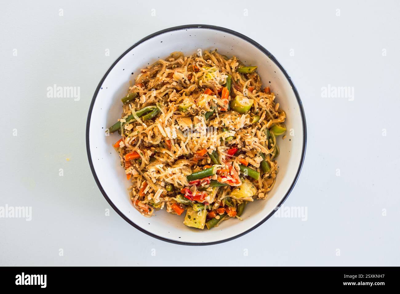 plant-based satay vermicelli noodle dish with veggies and tofu, healthy ...