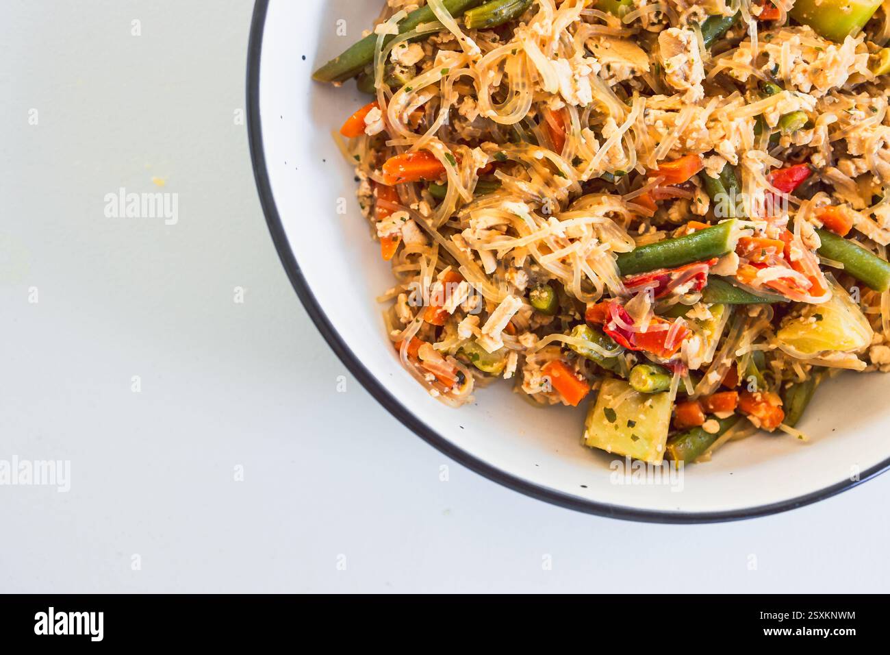 plant-based satay vermicelli noodle dish with veggies and tofu, healthy ...