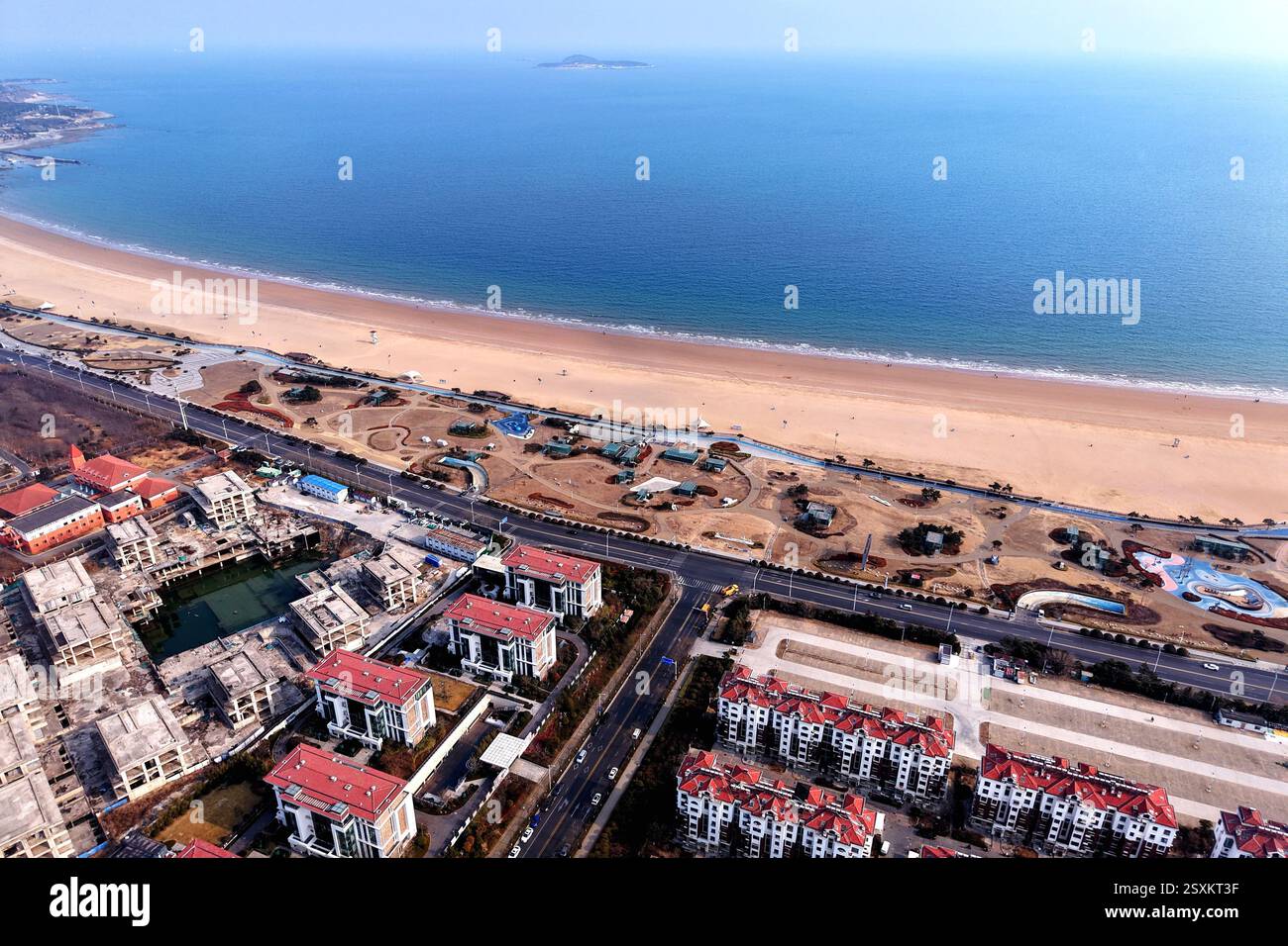 Aerial photo shows the early spring scenery of a golden beach in ...