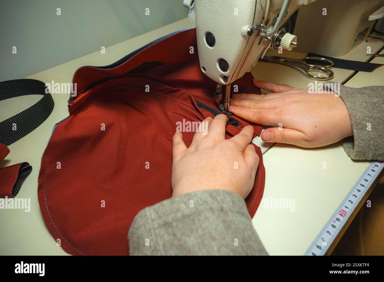 Handmade tailoring workshop with sewing machine Stock Photo - Alamy