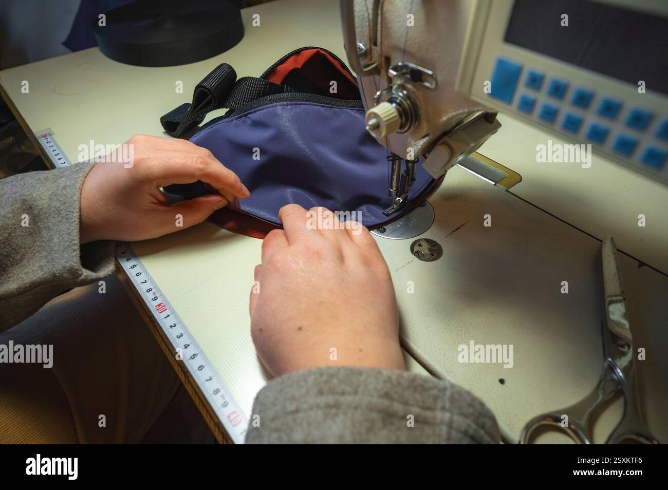 Handmade tailoring workshop with sewing machine Stock Photo - Alamy