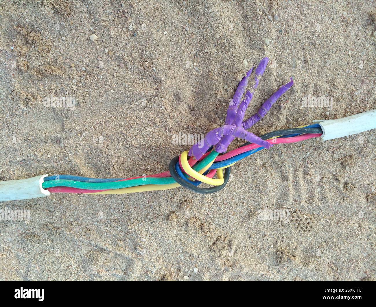 bad repair of electricity wire on the beach Stock Photo - Alamy