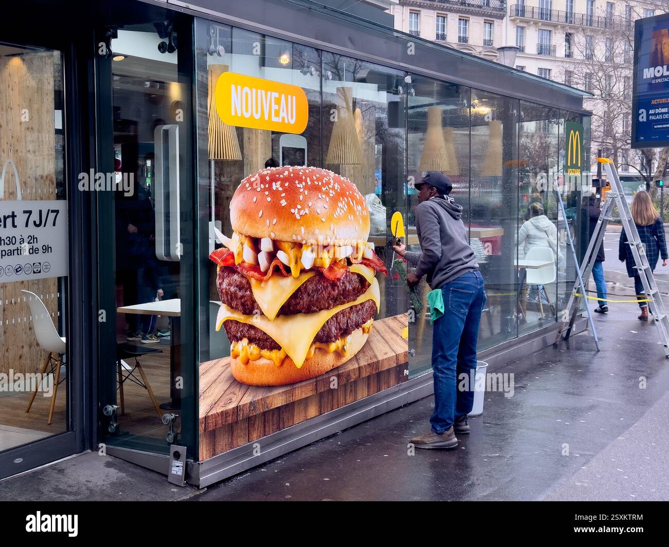 Brightly colored burger window display catches attention in urban ...