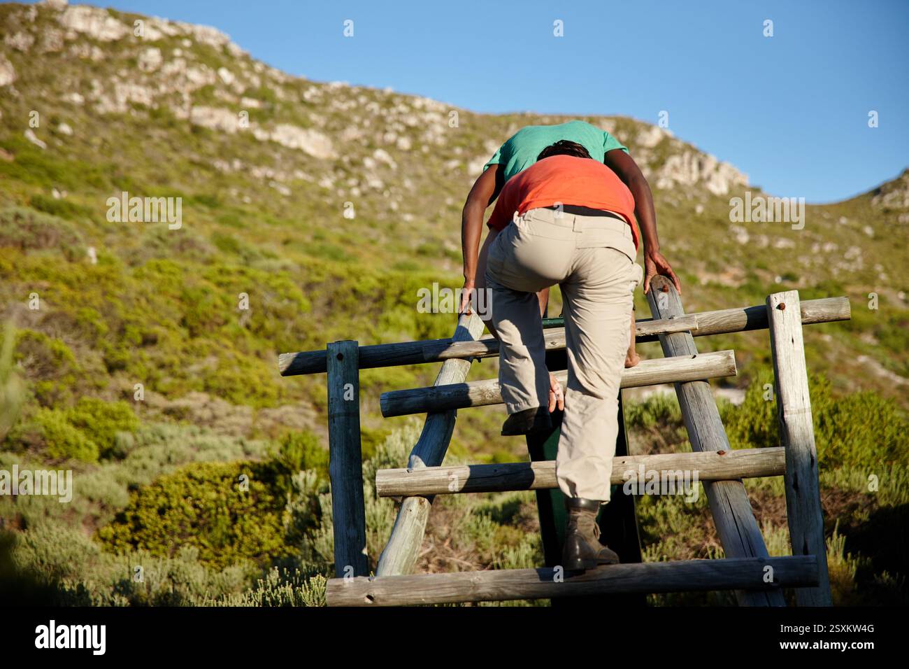 Athlete, people and climbing on obstacle outdoor for physical strength ...