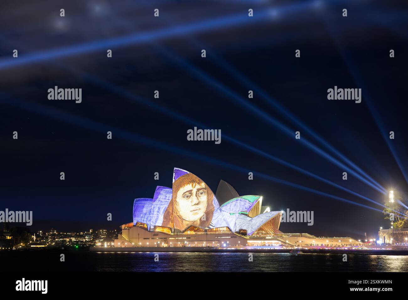 Spotlights fill the sky above the Sydney Opera House during the Vivid ...