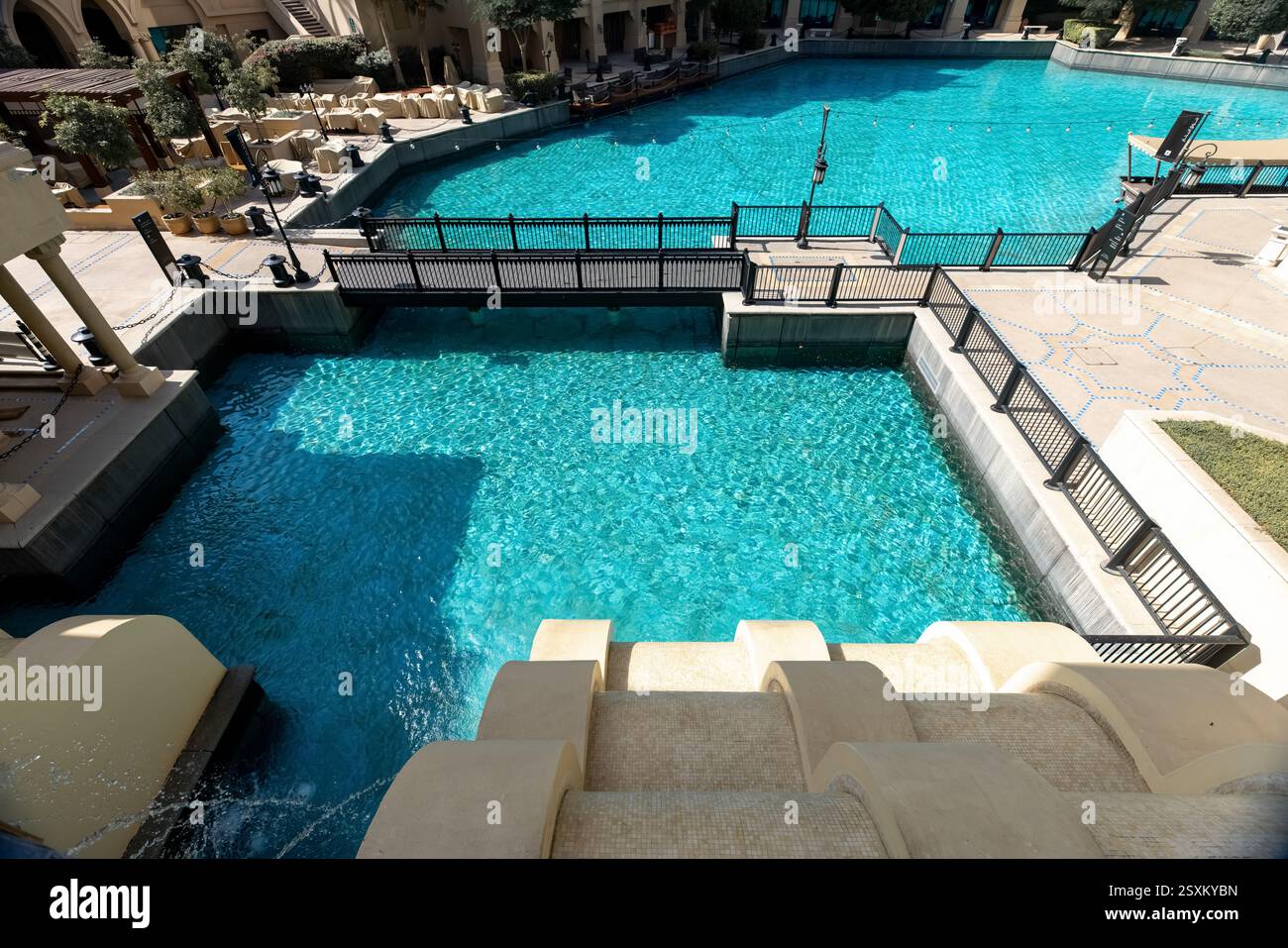 Dubai, UAE - Feb 08, 2025: Luxury outdoor swimming pool and relaxing ...
