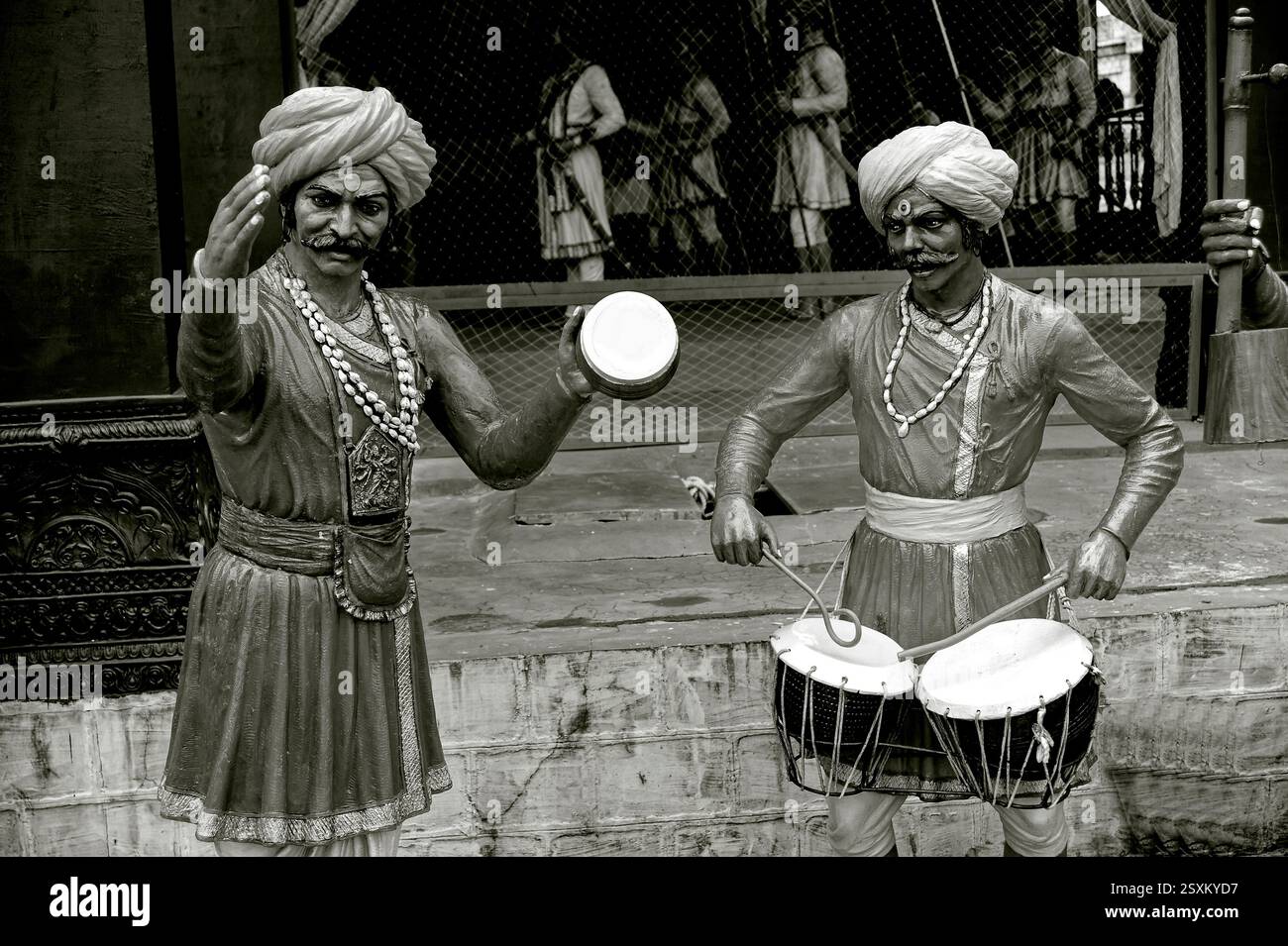 Black and white photo of statues of musicians playing musical ...