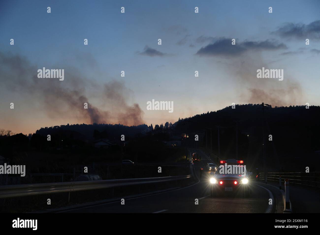 A photo shows a forest fire, continues to spread in Ofunato City, Iwate ...