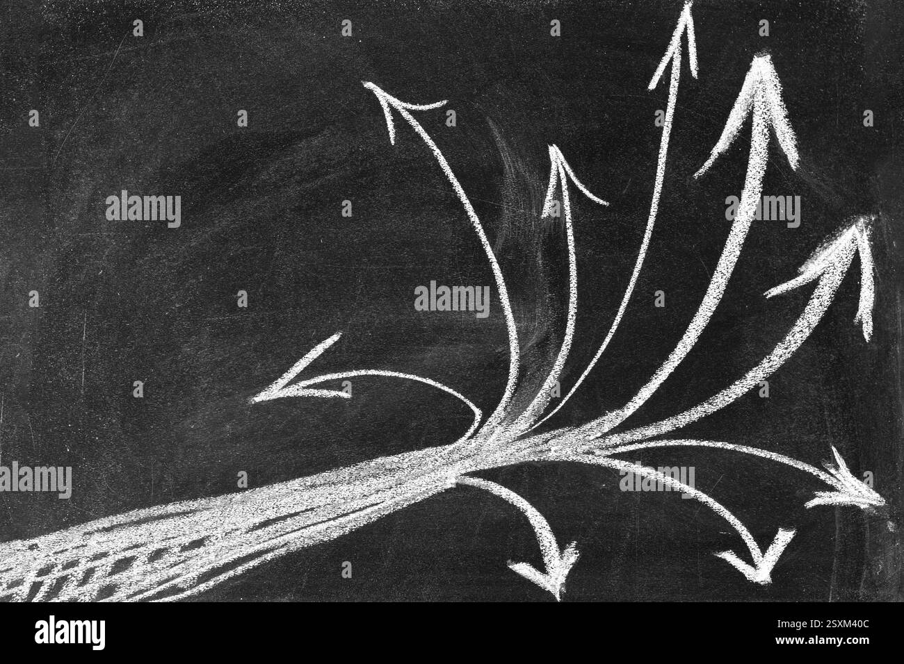 White chalk drawing of various arrows on black grunge background with ...