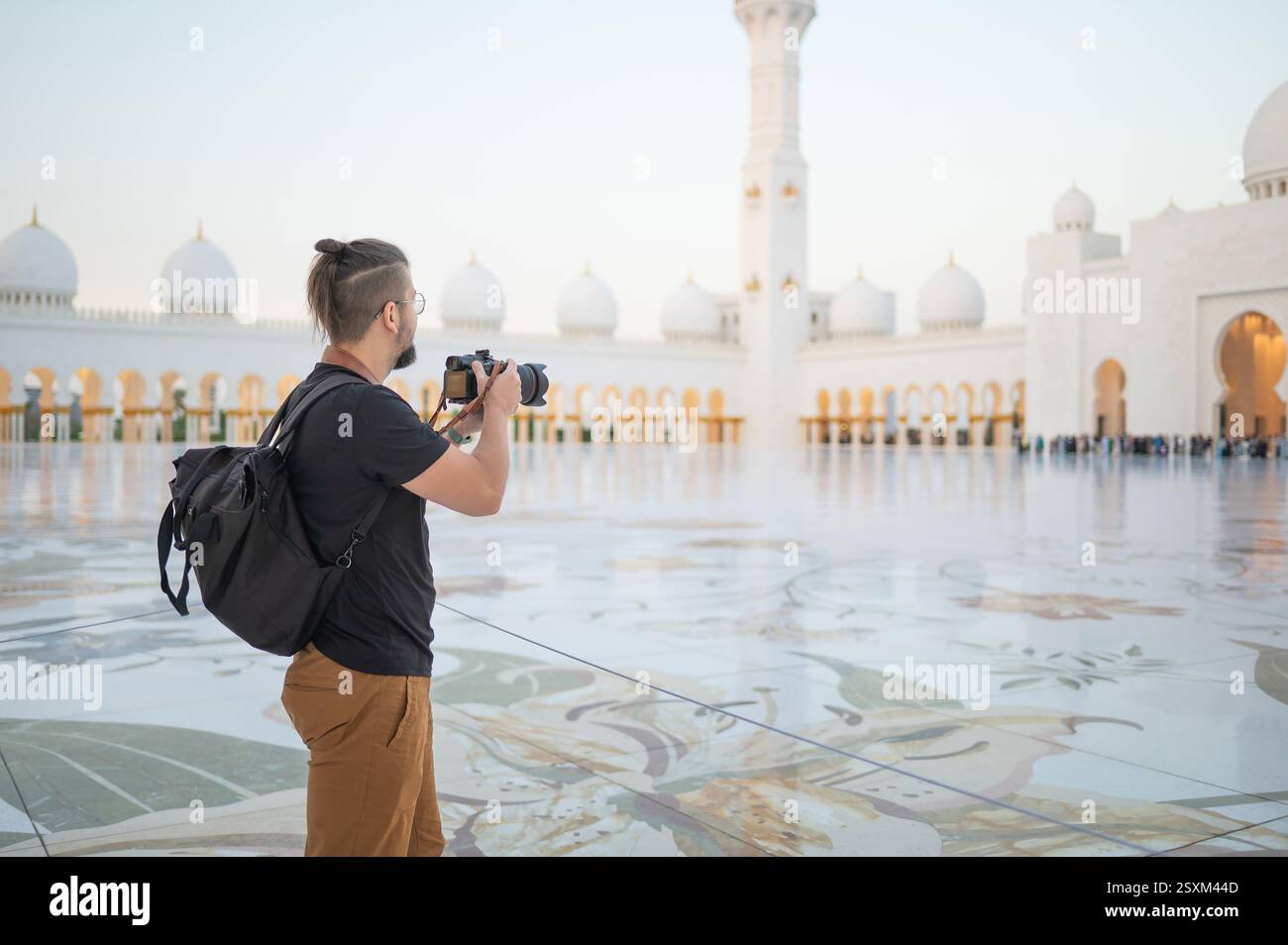 Man photographing the magnificent Sheikh Zayed Grand Mosque in Abu ...