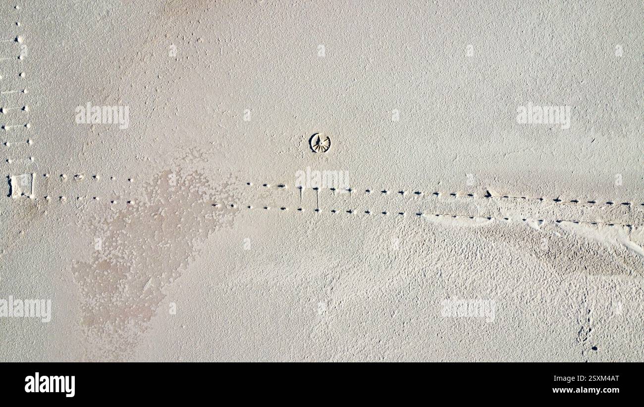 Sunken objects in a saltlake in the Australian outback, seen from above ...