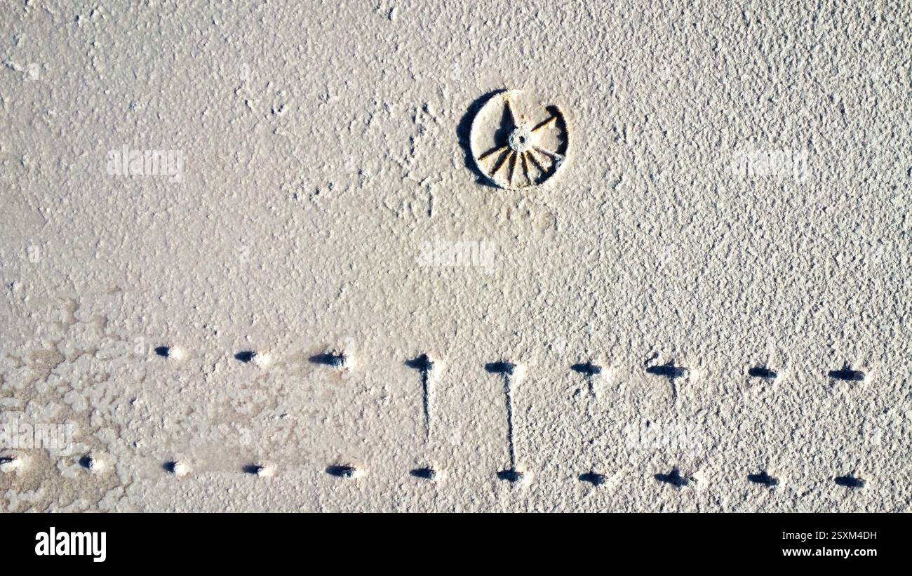Sunken objects in a saltlake in the Australian outback, seen from above ...