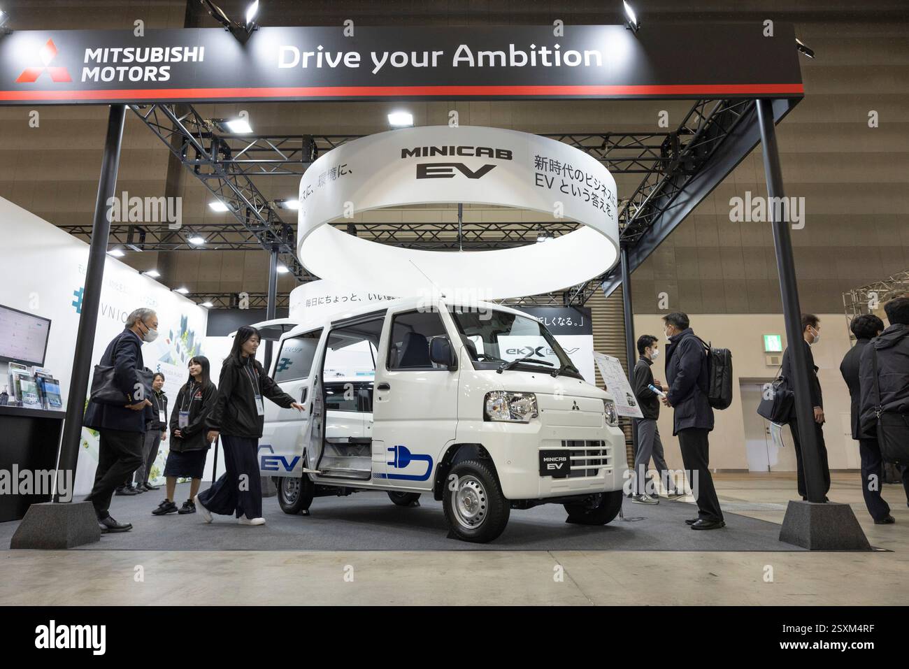 Mitsubishi Electric company's vehicle Minicab EV on display at Smart ...