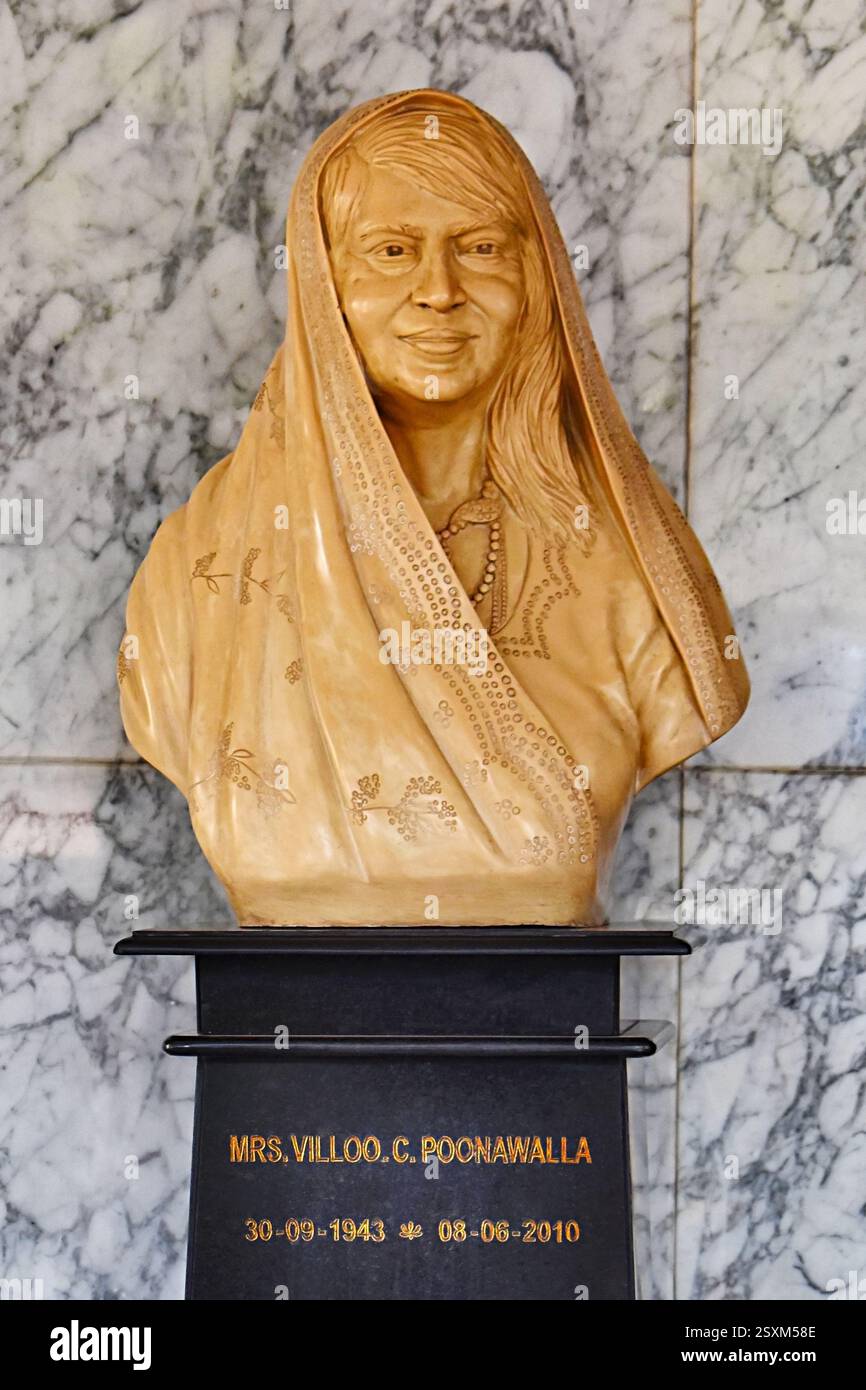 Close-up of Mrs. Villoo C. Poonawalla's portrait statue at Komra Agiary ...