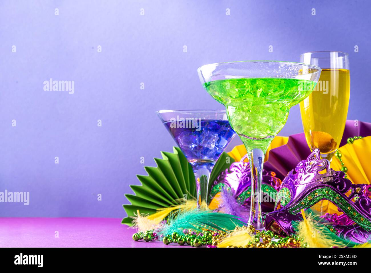 Mardi gras cocktails set. Colorful purple, yellow, green martini ...