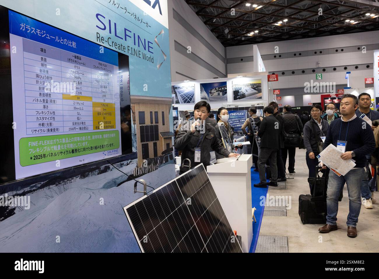 Tokyo, Japan. 19th Feb, 2025. An exhibitor gives a presentation on ...