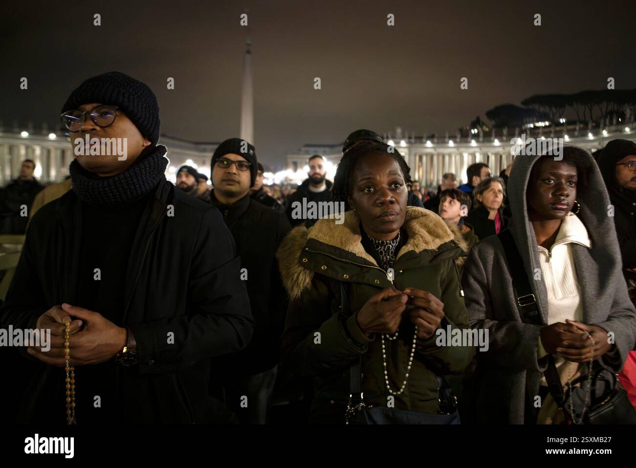 Vatican City, Vatican, 24 February 2025. Faithful pray during a rosary ...