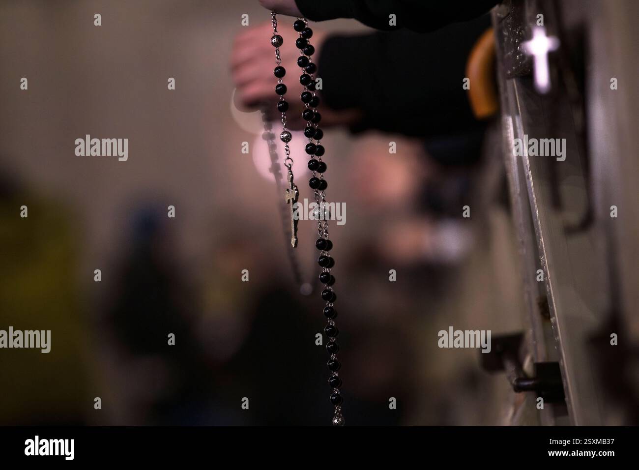 Vatican City, Vatican, 24 February 2025. Faithful pray during a rosary ...