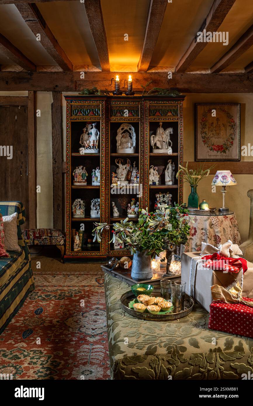 Staffodshire pottery displayed in decorative Indian bookcase in ...