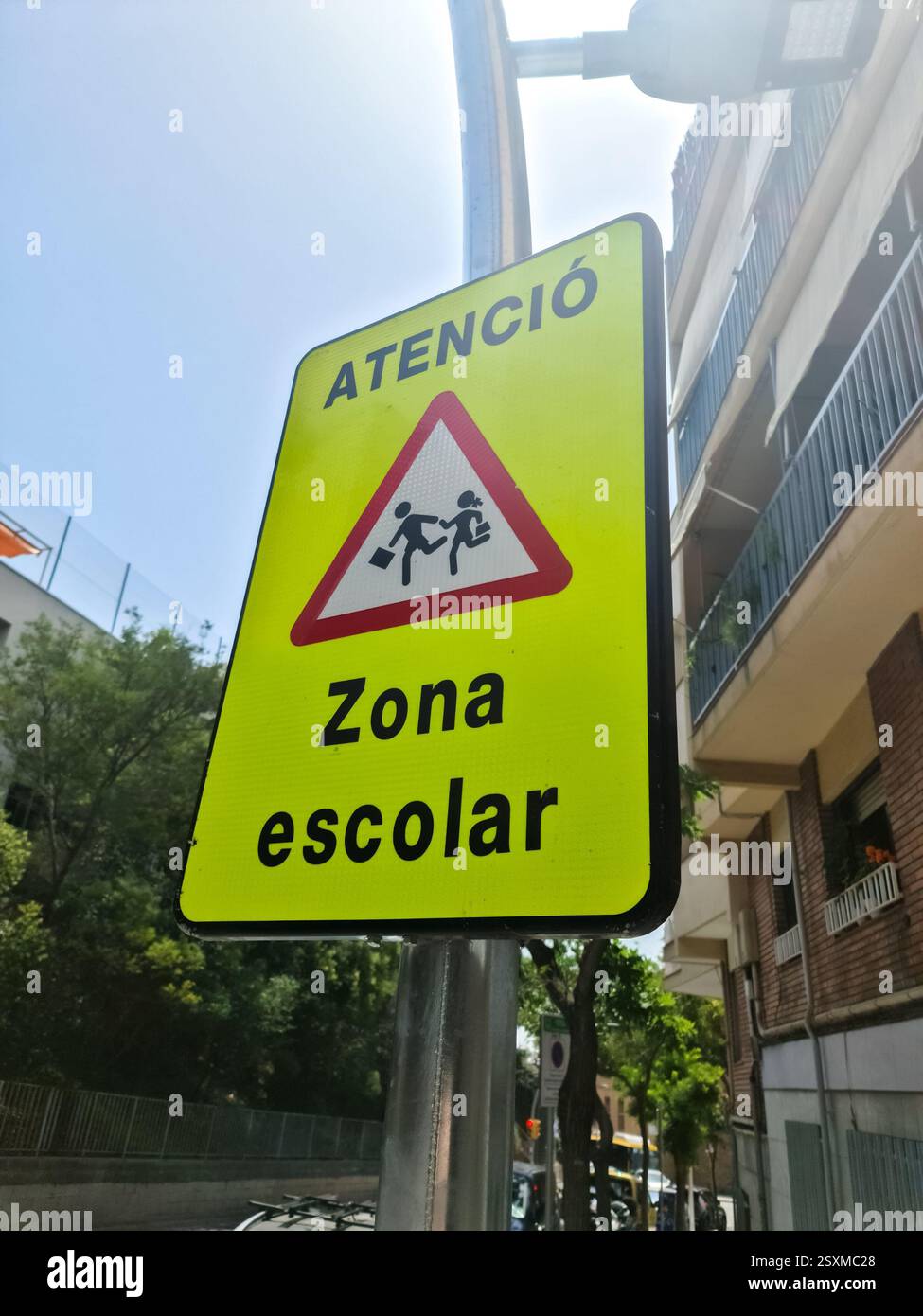Barcelona, 18. July 2024: Yellow school zone warning sign in Barcelona ...