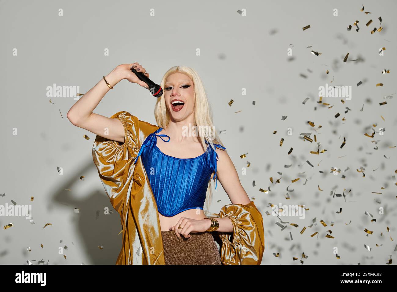 Joyful drag queen radiates confidence while celebrating with a ...