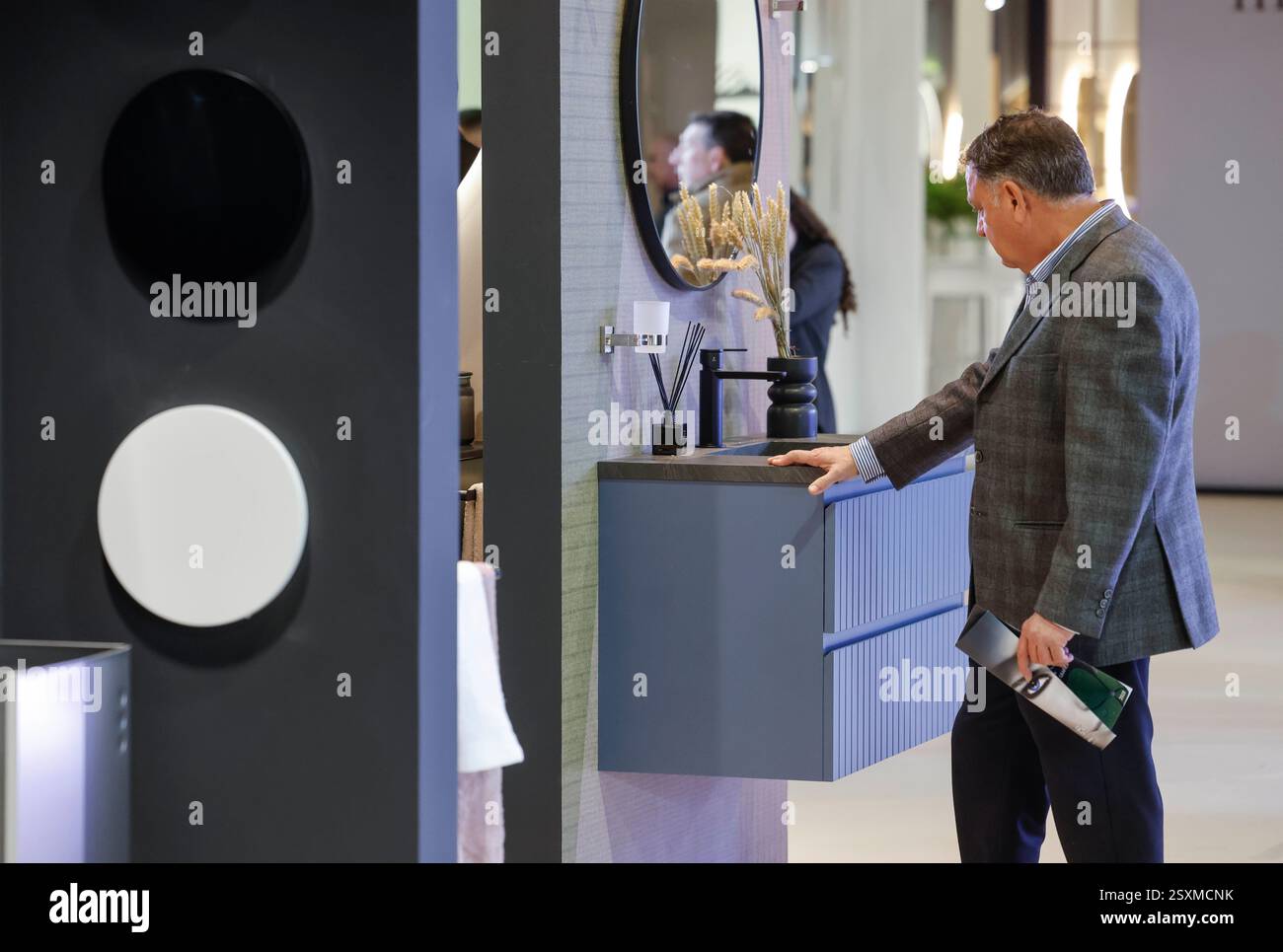 People visit stands at the international ceramics, bathroom equipment ...