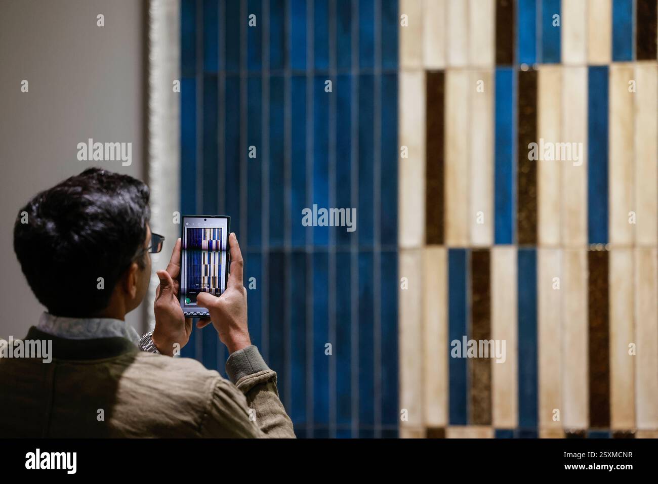 People visit stands at the international ceramics, bathroom equipment ...