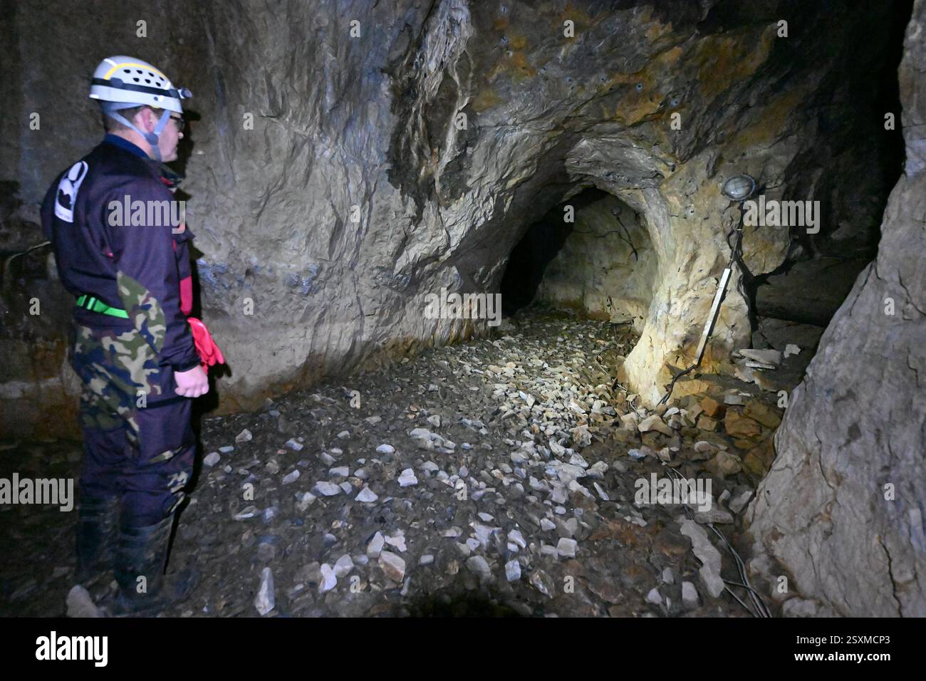 Workers repair electrical installation in tourist route along the ...