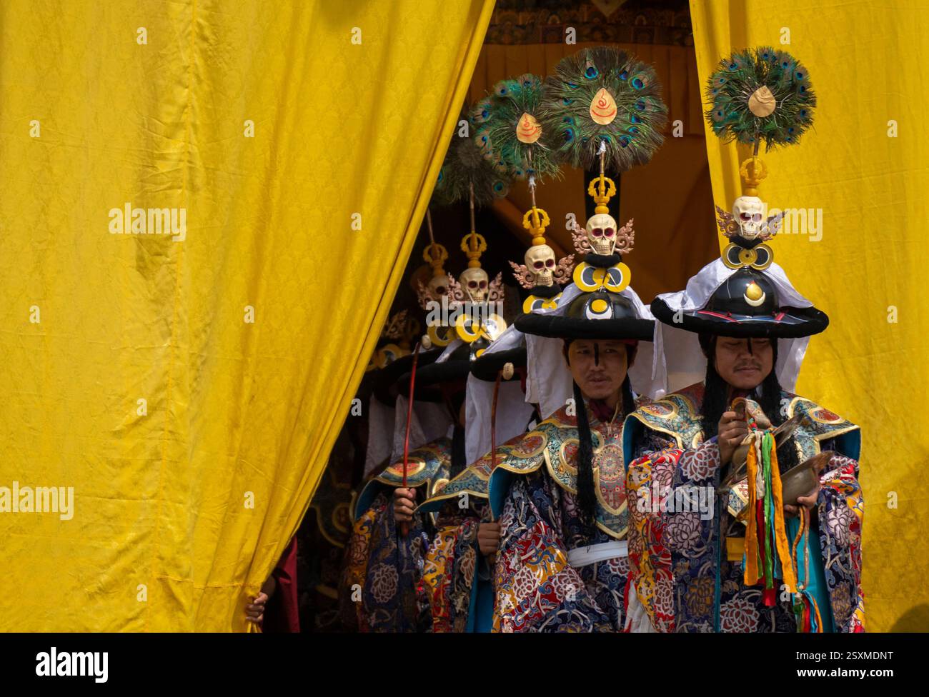 Buddhist monks perform a traditional dance during Gyalpo Losar, the ...
