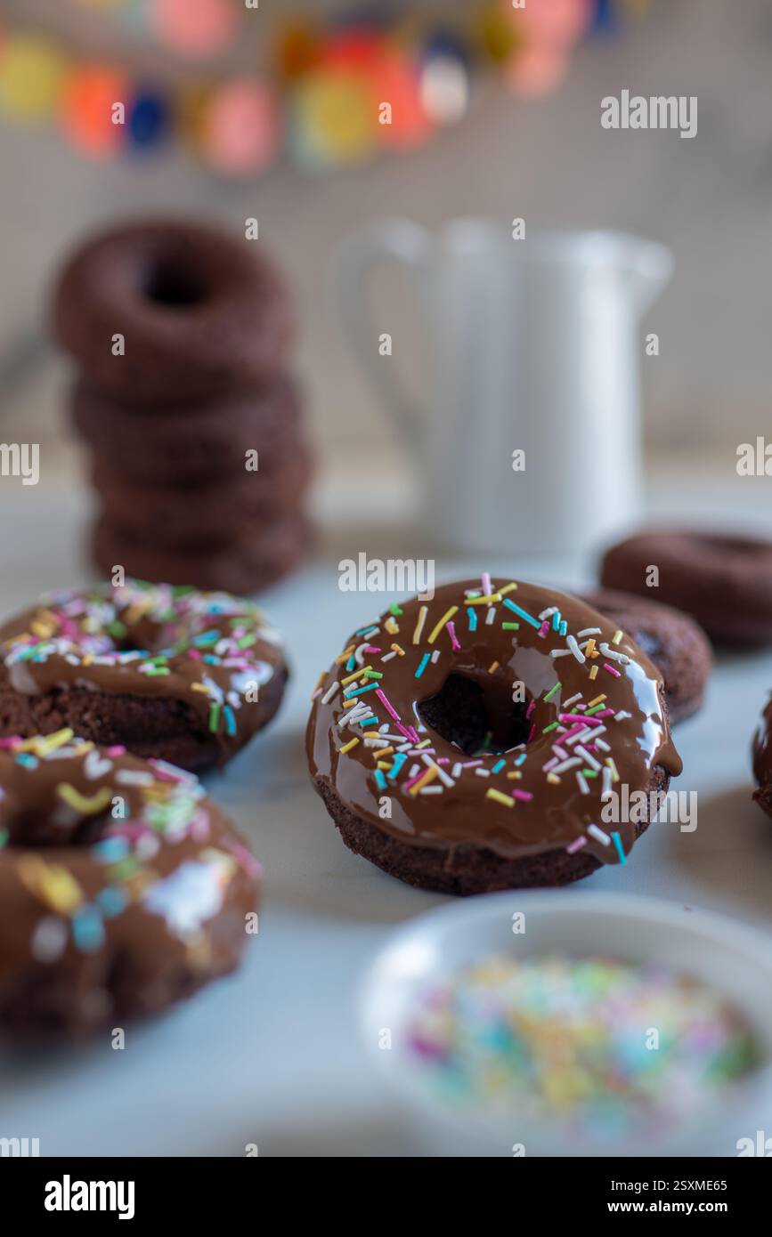 Assorted donuts with chocolate frosted Stock Photo - Alamy