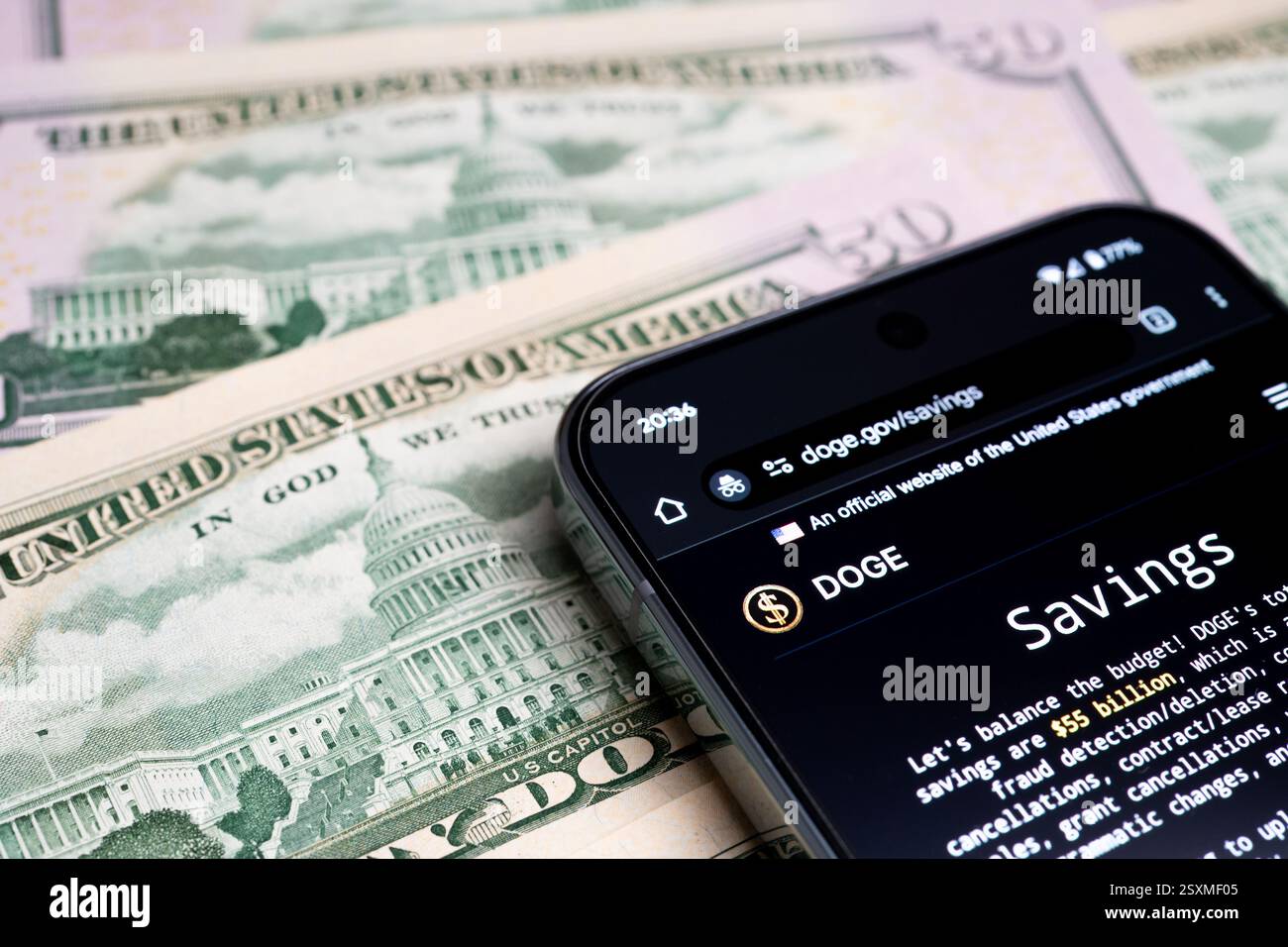 DOGE US Department of Government Efficiency logo seen on the smartphone ...