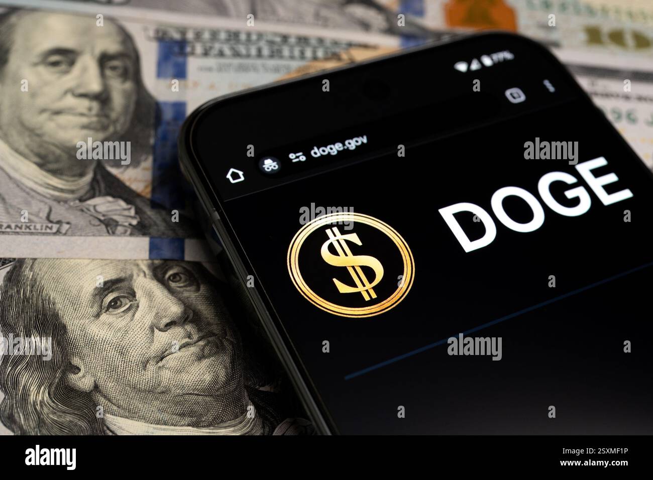 DOGE US Department of Government Efficiency logo seen on the smartphone ...