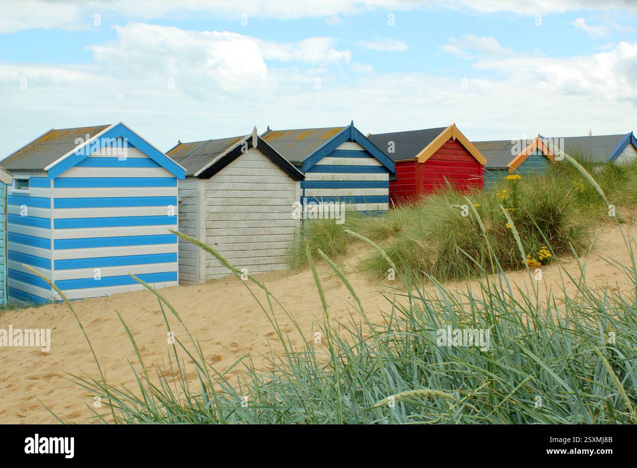 Southwold beach. Beach huts on Southwold beach in summer, Suffolk, UK ...
