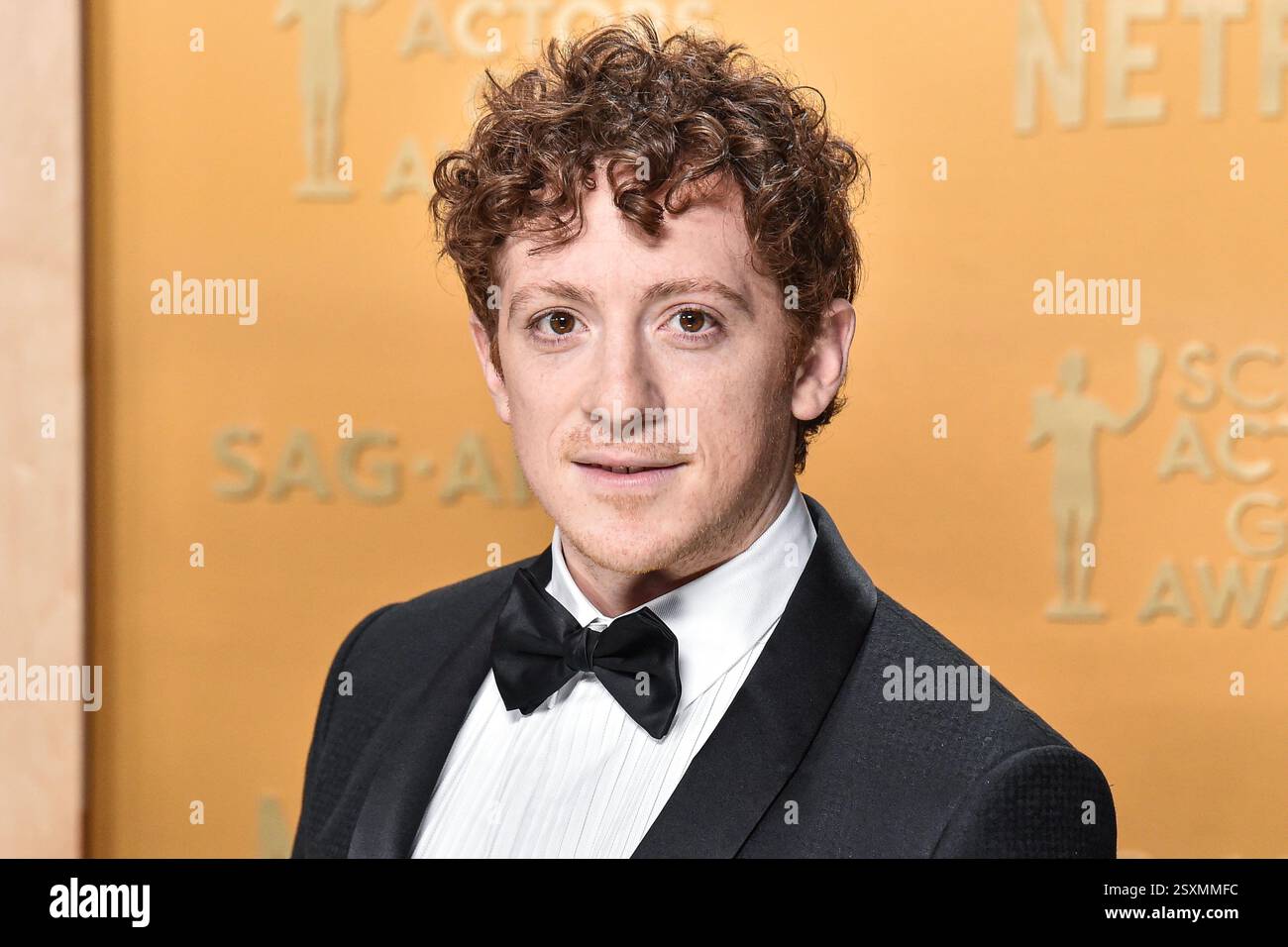 LOS ANGELES, CALIFORNIA, USA - FEBRUARY 23: Ethan Slater wearing a ...