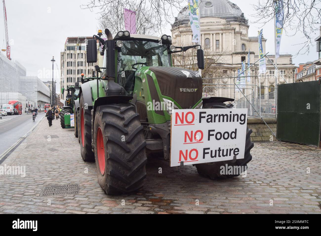 London, UK. 25th February 2025. Farmers park tractors outside the Queen ...