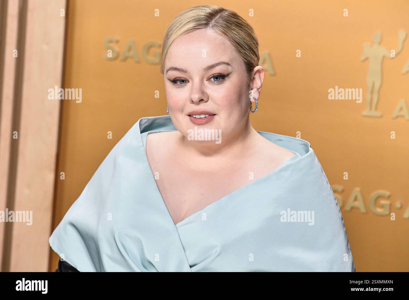 LOS ANGELES, CALIFORNIA, USA - FEBRUARY 23: Nicola Coughlan wearing a ...