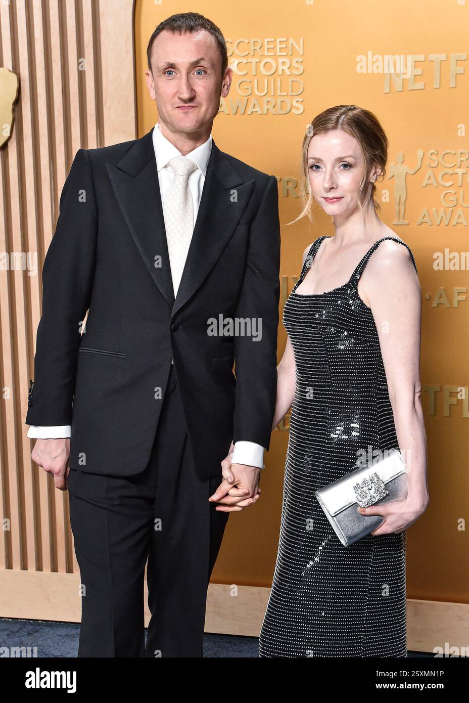 LOS ANGELES, CALIFORNIA, USA - FEBRUARY 23: Tom Brooke and wife Fiona Glascott arrive at the ...