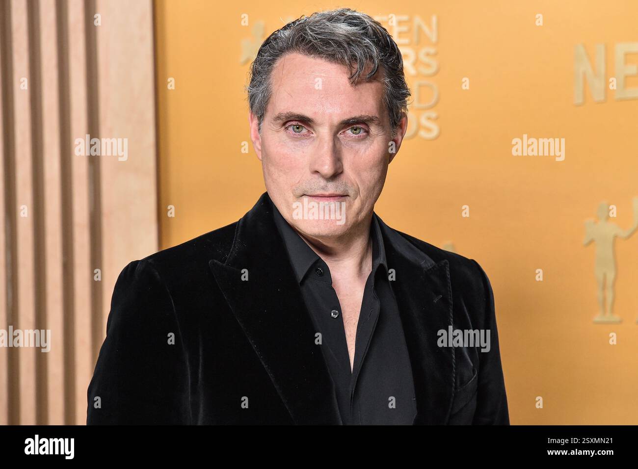 LOS ANGELES, CALIFORNIA, USA - FEBRUARY 23: Rufus Sewell arrives at the ...