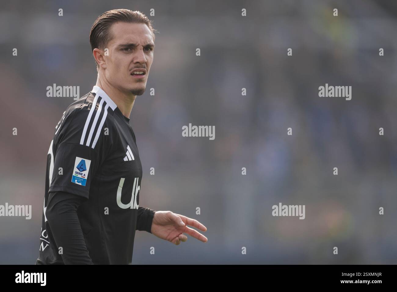 Como, Italy. 23 February 2025. Maxence Caqueret of Como 1907 looks on ...