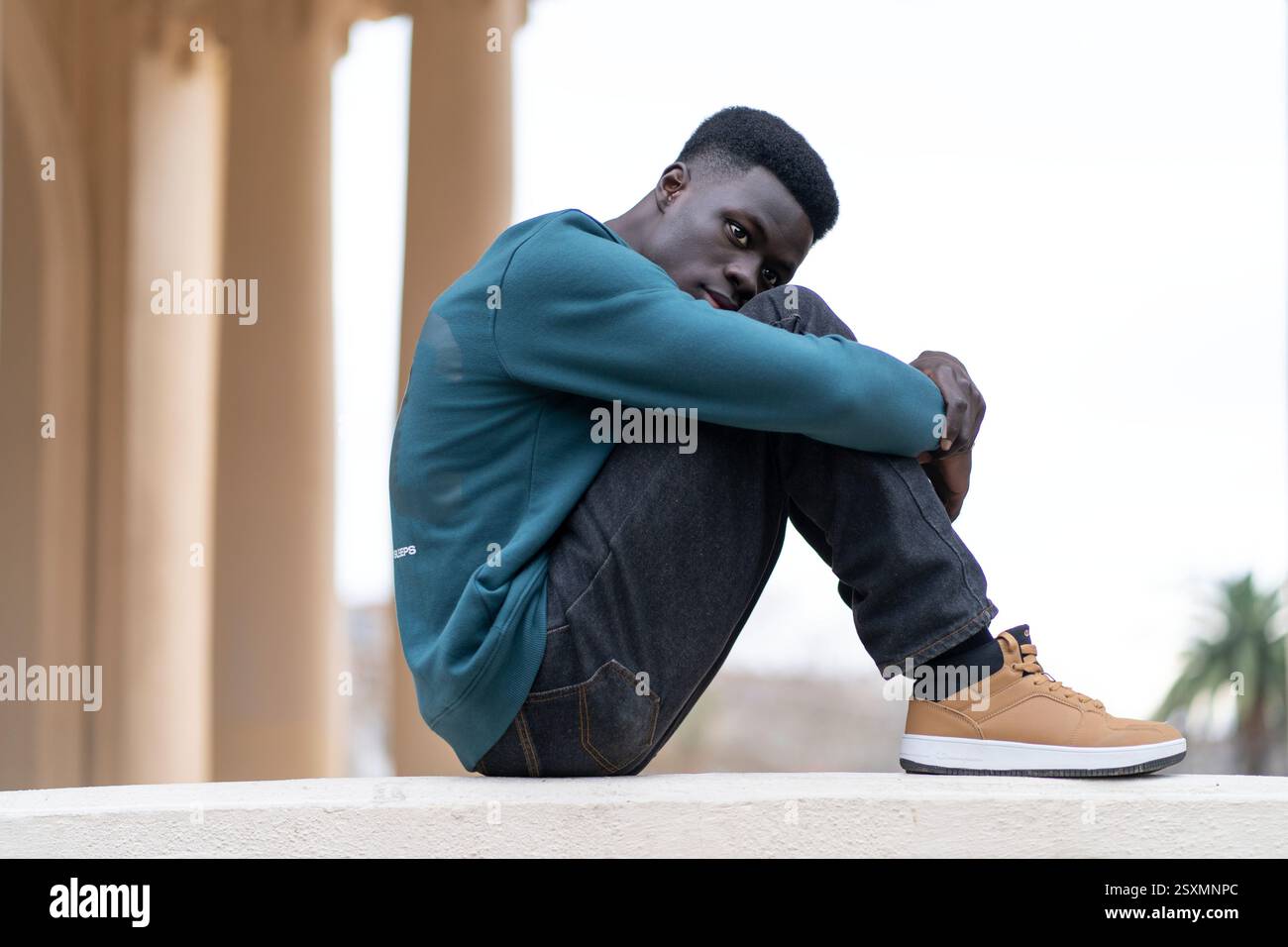 Young african american student feeling lonely and depressed, hugging ...